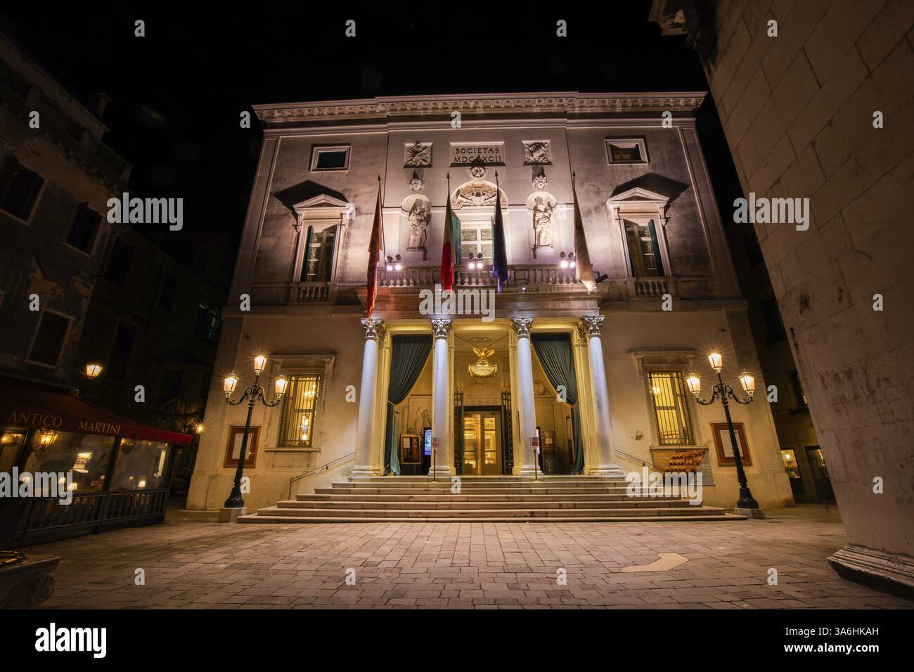 Entrance area, facade of the opera house Teatro la Fenice, night shot ...