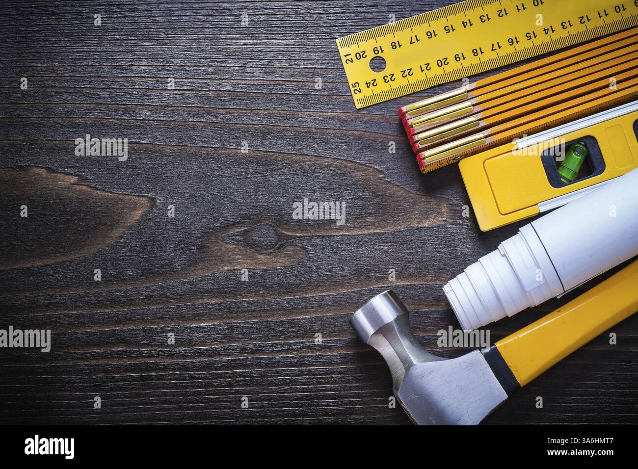 Set of building objects for maintenance works on vintage wooden surface ...