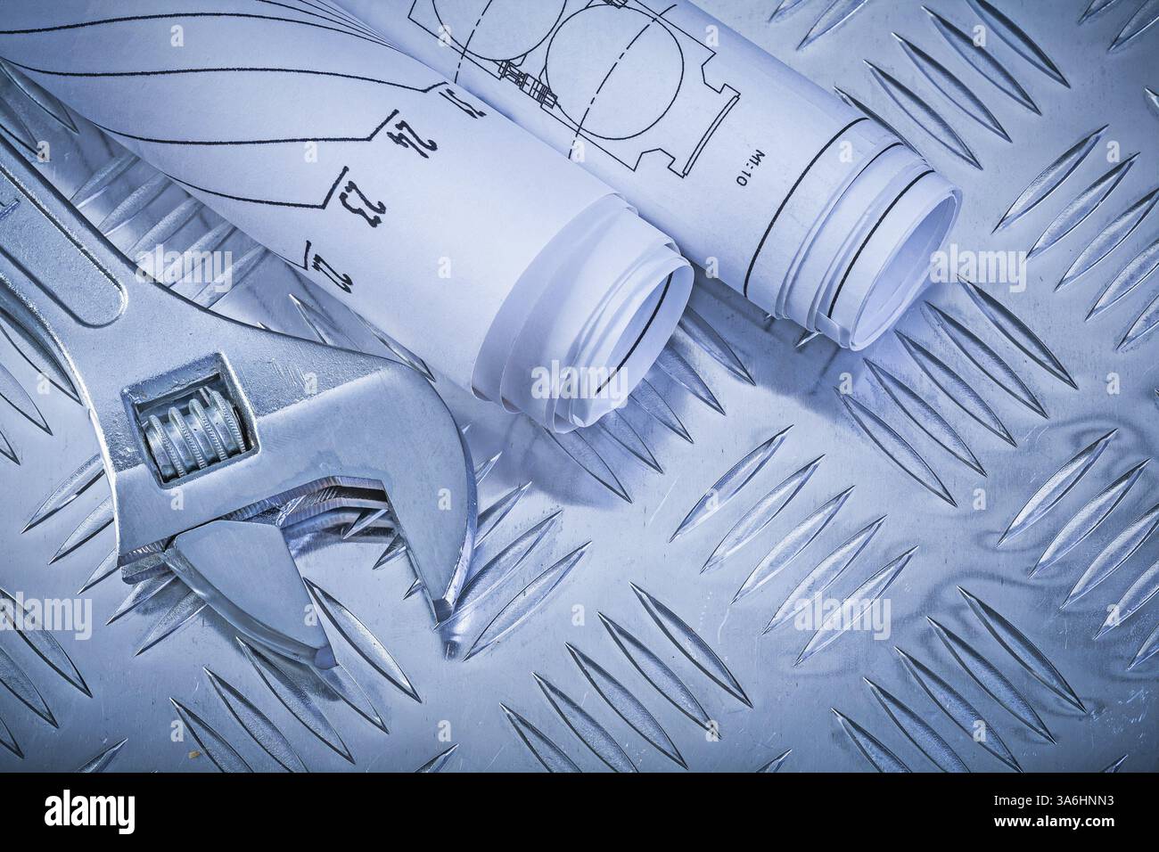 Engineering drawings monkey spanner on fluted metal sheet construction ...
