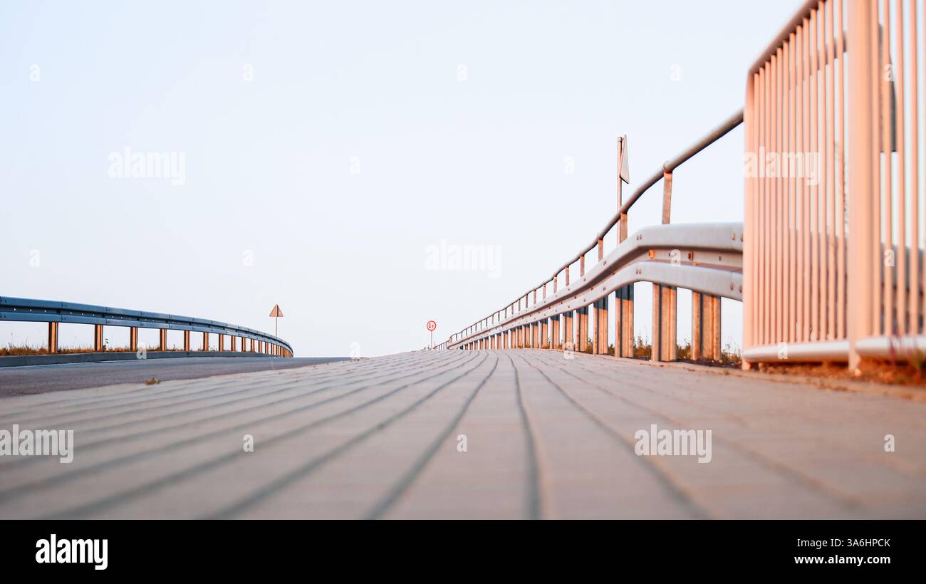 Road and Pedestrian Walkway on a Viaduct with Safety Barriers Under a ...