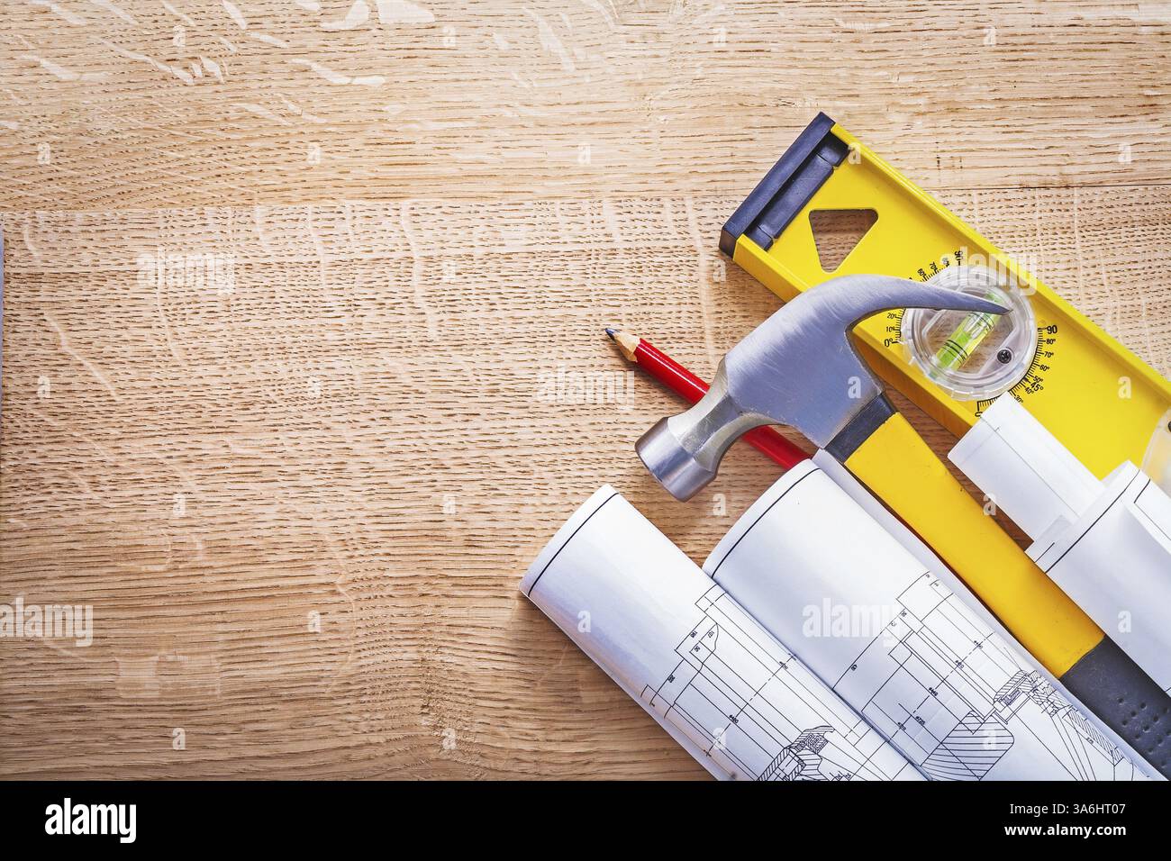 Claw hammer rolled blueprints level board construction concept Stock ...