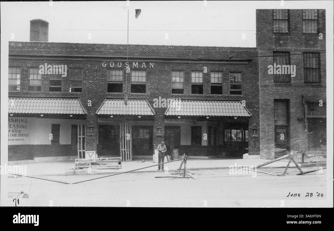 A historical image of Goosman's Garage before street widening shows the ...