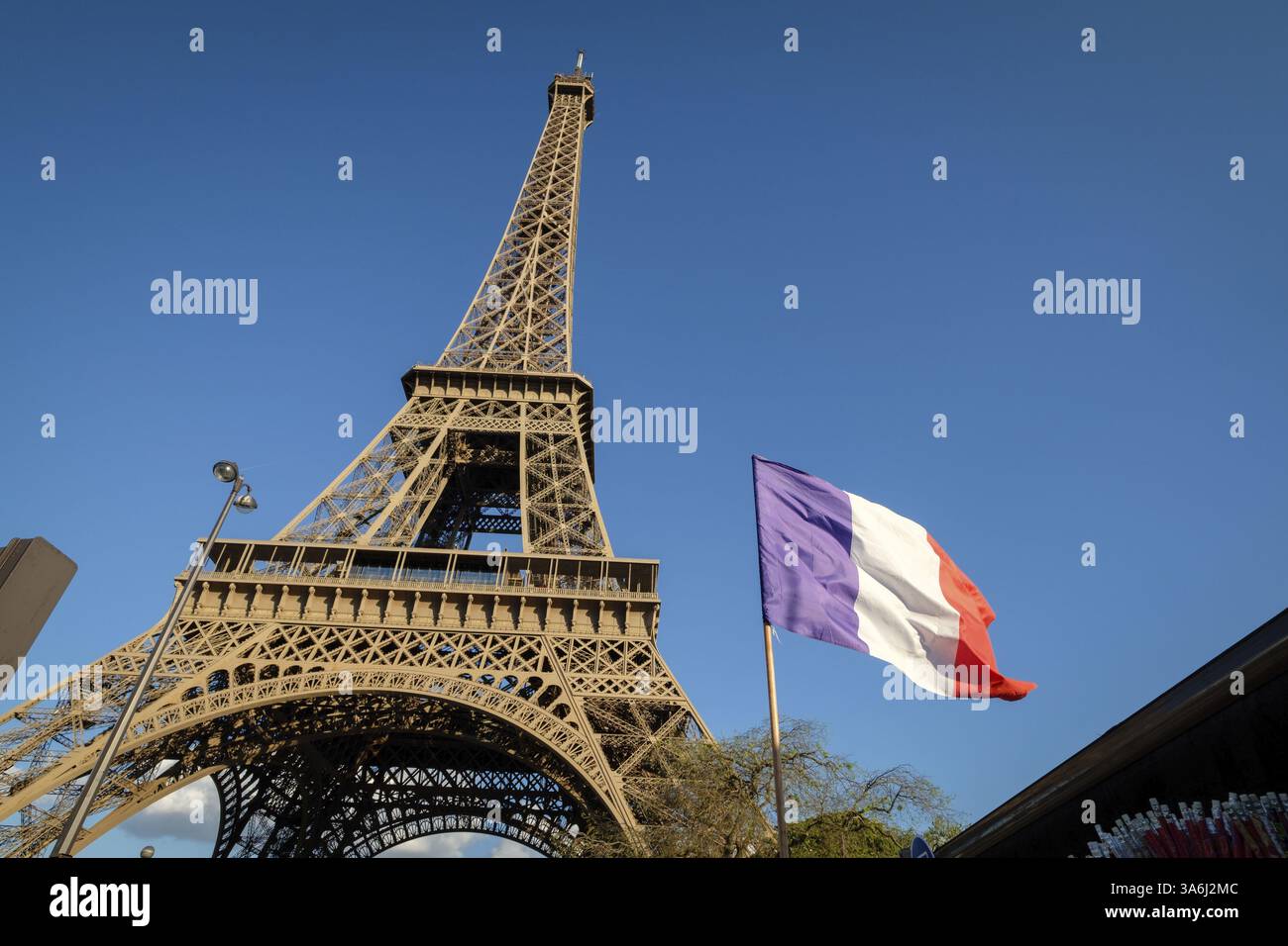 French flag (flag of france) in front of the Eiffel Tower, 1889, Champ ...