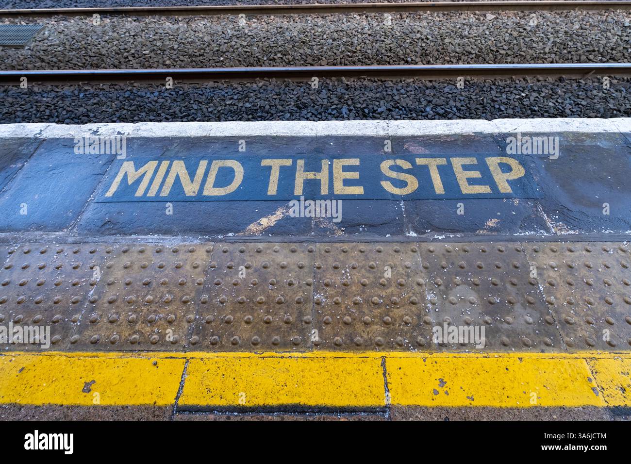Mind The Step Sign on a British Railway Station Platform Stock Photo ...