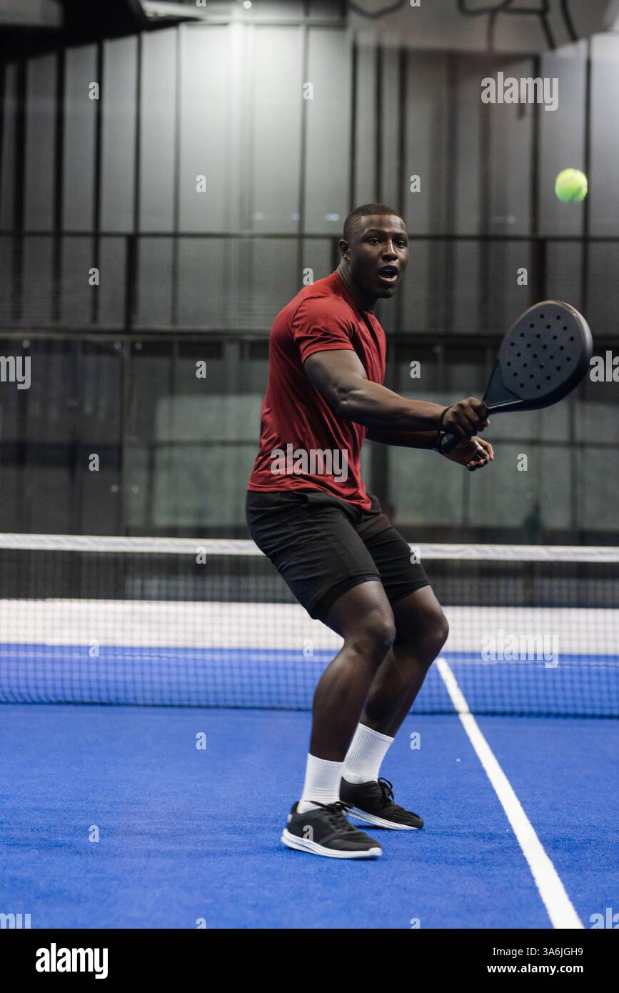 Focused athlete playing padel tennis hi-res stock photography and ...
