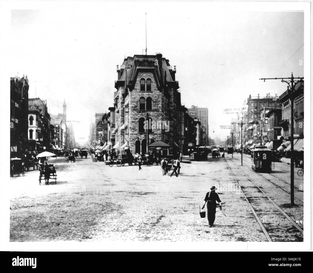 This historical photograph captures a view of Bridge Square, looking ...