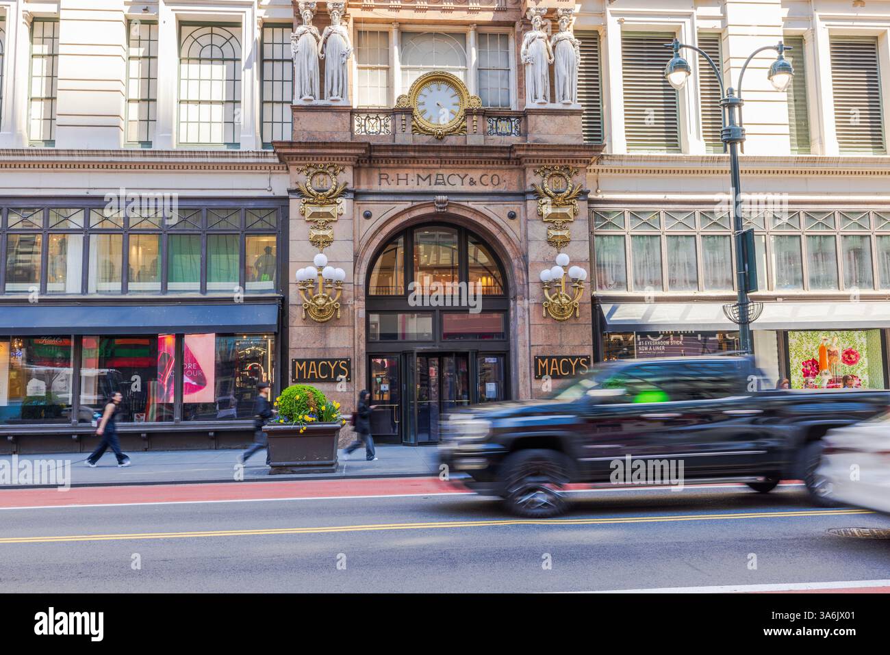 Historic entrance to Macy's department store with gold details and ...