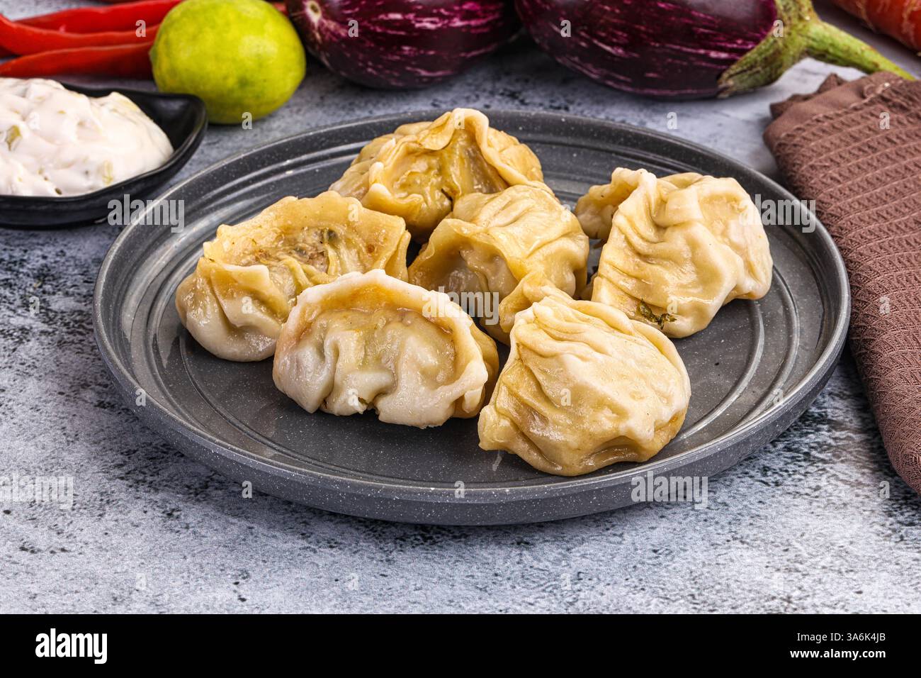Steamed Nepali traditional Momo stuffed dumplings Stock Photo - Alamy