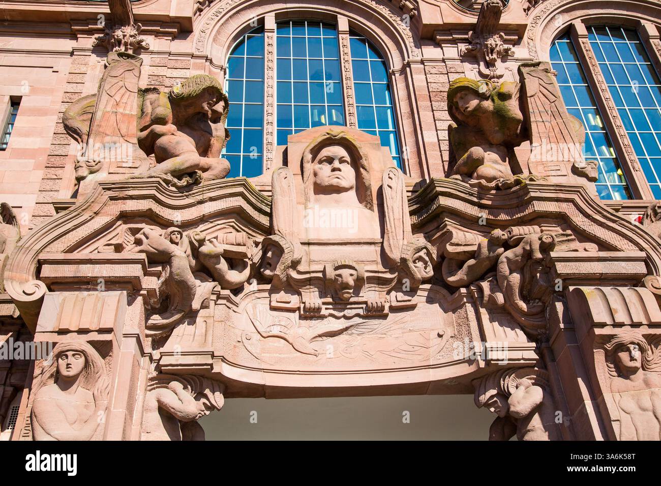 Facade sculpture carved from red stone Stock Photo - Alamy