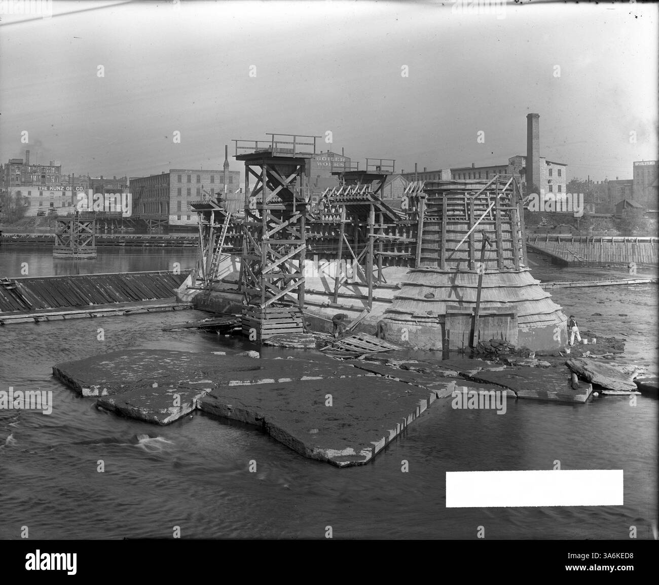 Construction workers set forms for Pier #4 as part of the ongoing work ...