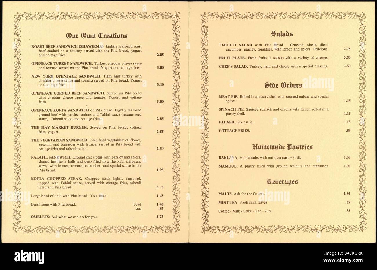 This bi-fold menu, printed on cream cardstock with a brown leaf border ...