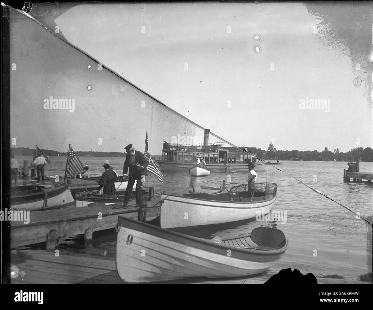 This image shows a Twin City Lines launch on its way to Tonka Bay, with ...