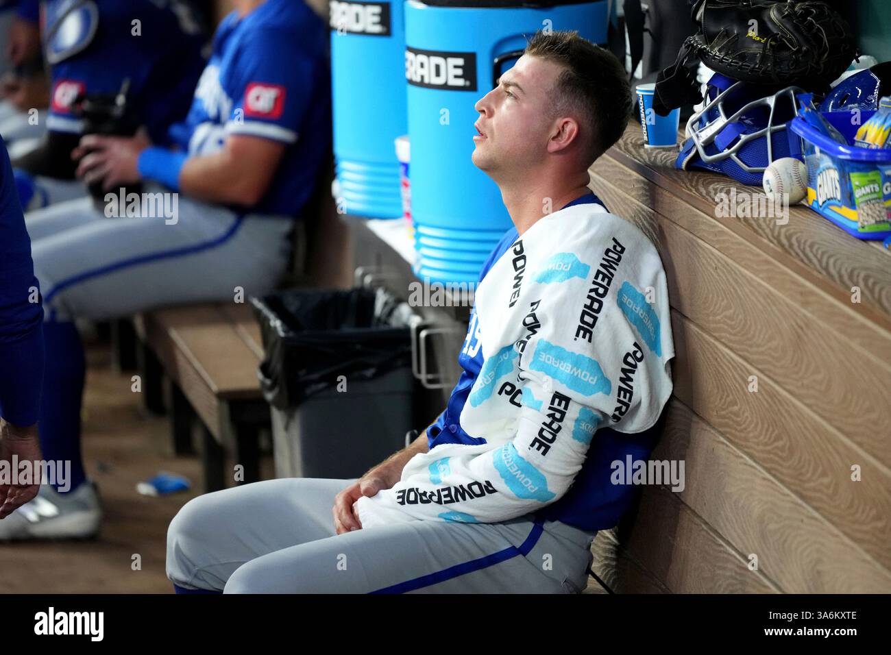 Kansas City Royals starting pitcher Kris Bubic rests in the dugout ...