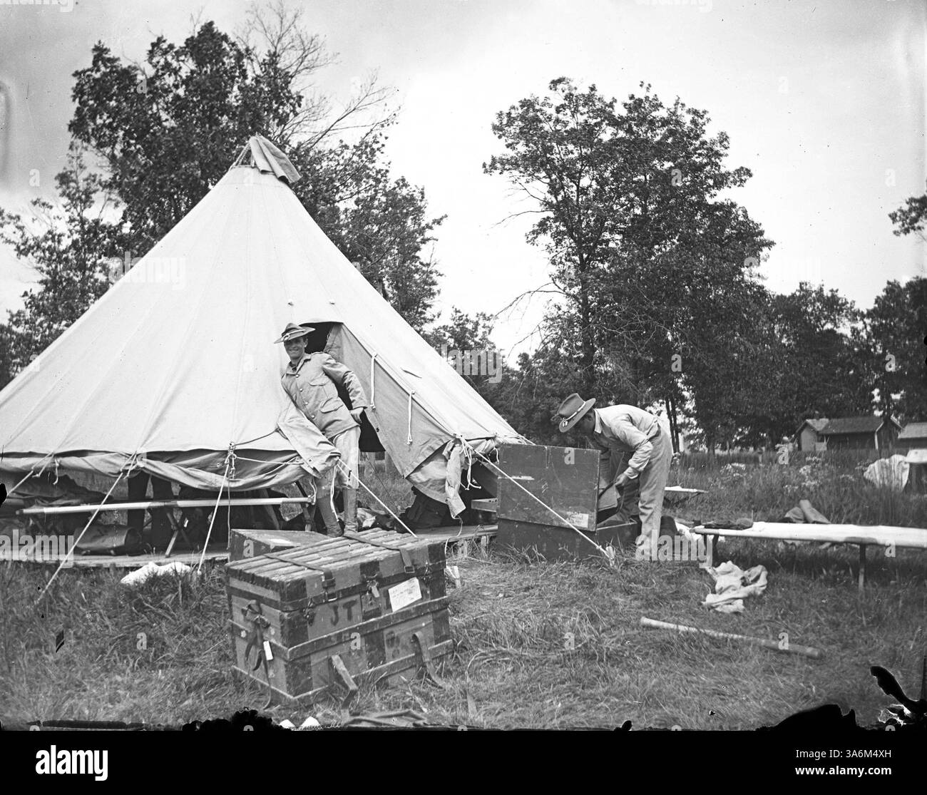 Members of the 45th Infantry are shown setting up camp at Fort Snelling ...