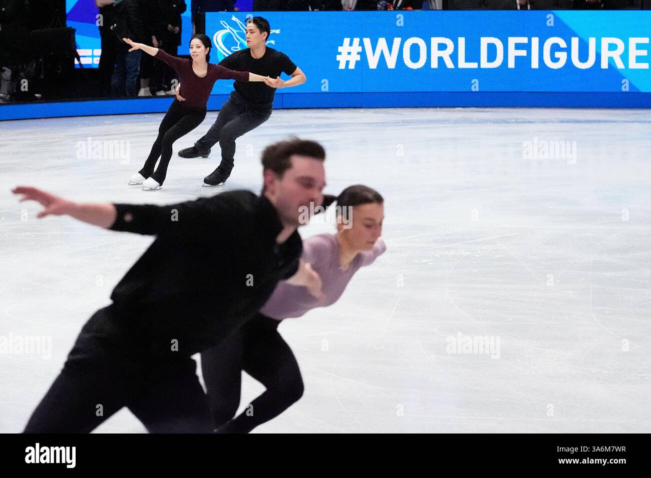 Riku Miura and Ryuichi Kihara, of Japan, top left, follow Maria Pavlova ...