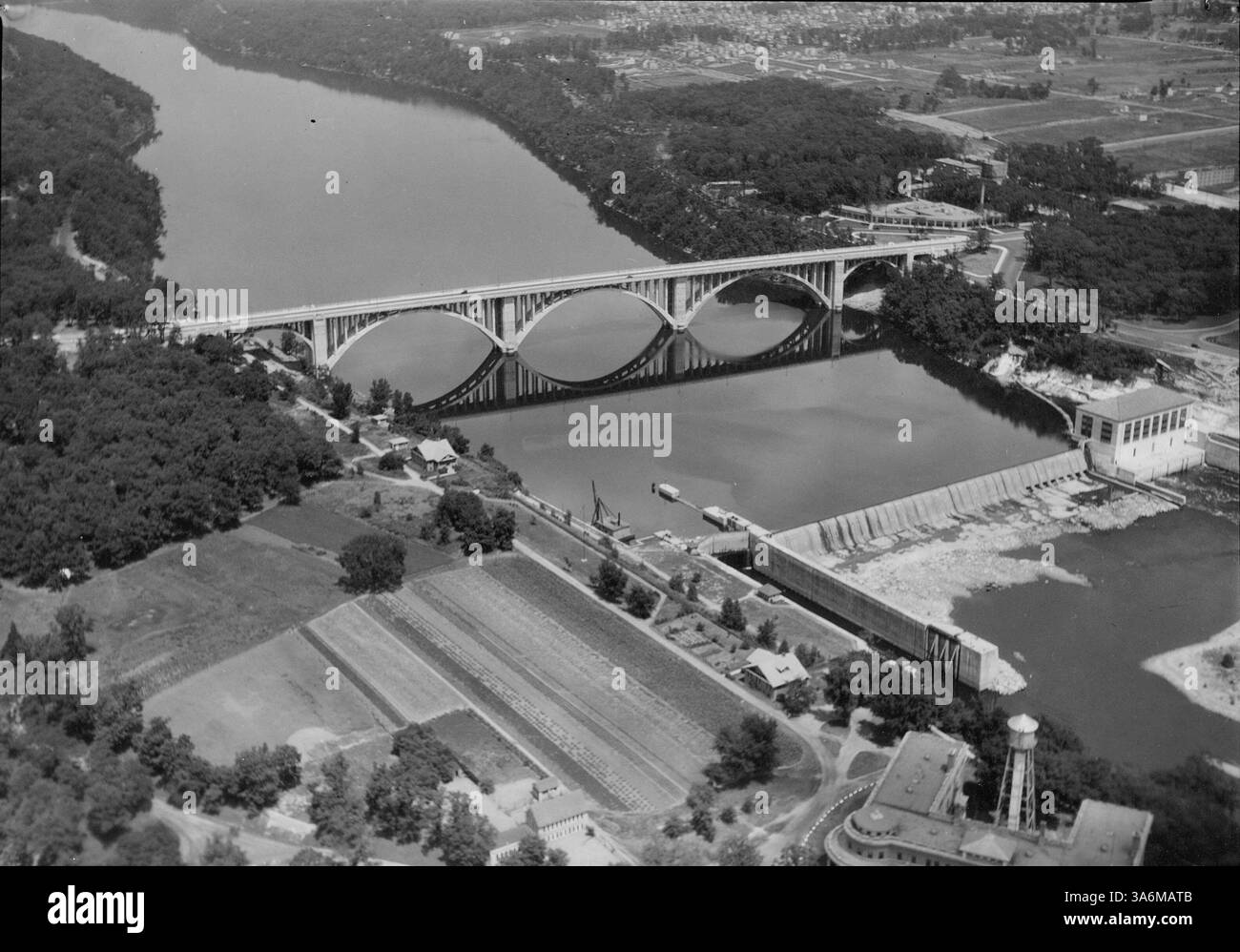 This aerial view of the Ford Bridge with the accompanying Lock and Dam ...