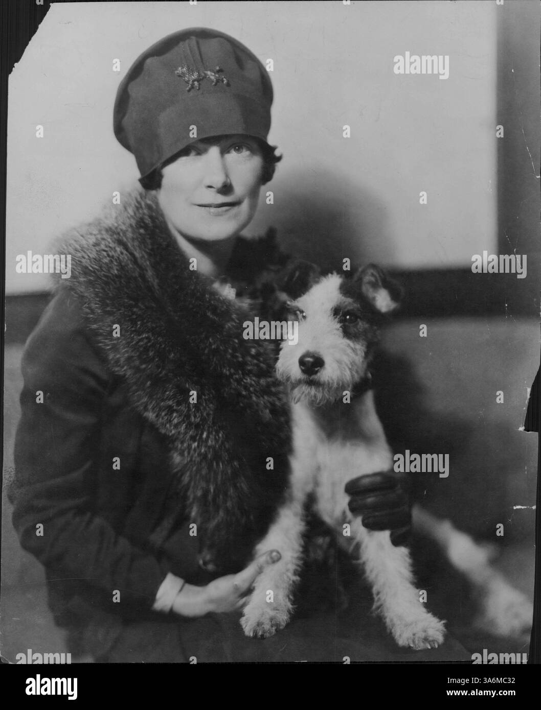 Mrs. Frank B. Jaffray is pictured with her dog Mickerruche, an intimate ...