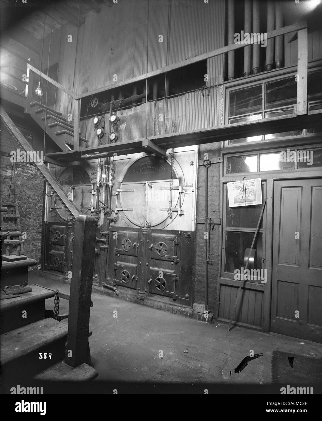 This image depicts the interior of the boiler room at Holmes School ...