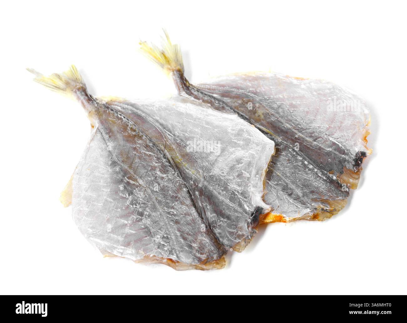 Dried cod fish fillets isolated on white Stock Photo - Alamy