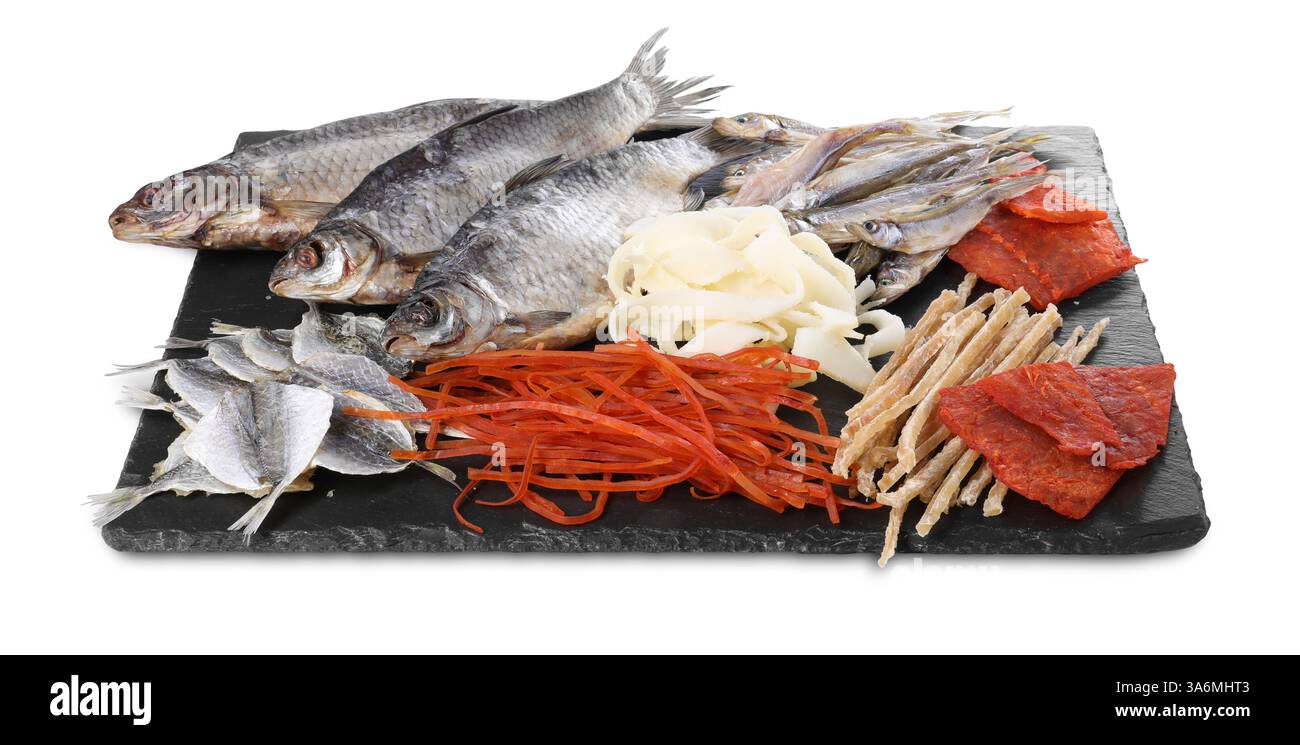 Many different dried fish snacks isolated on white Stock Photo - Alamy