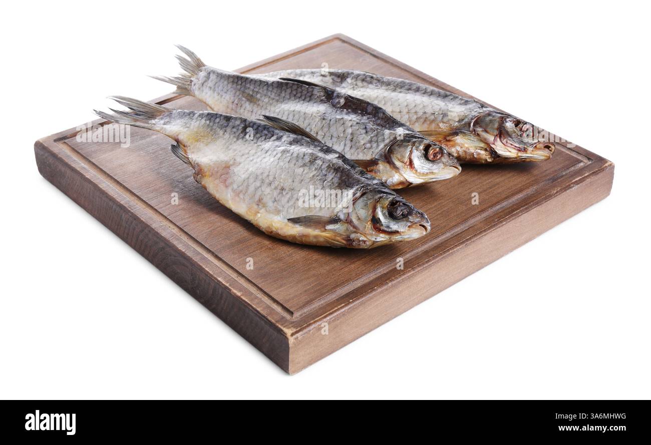 Dried salted roach fish isolated on white Stock Photo - Alamy