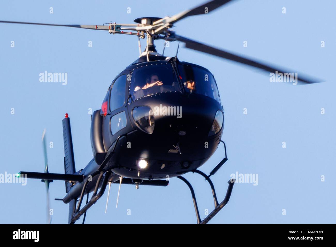Tom Cruise flies his helicopter Stock Photo - Alamy