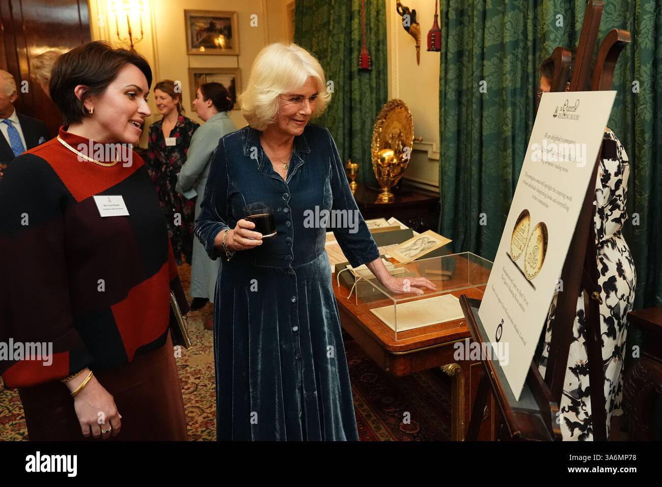 Vicki Perrin, CEO The Queen's Reading Room, and Queen Camilla review ...