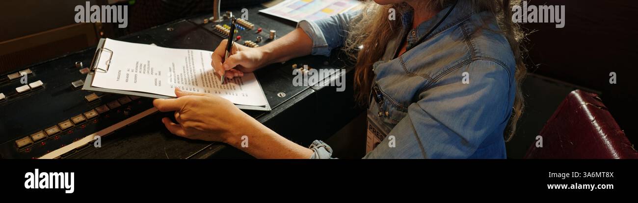 Header of modern female journalist sitting by workplace in TV van and ...