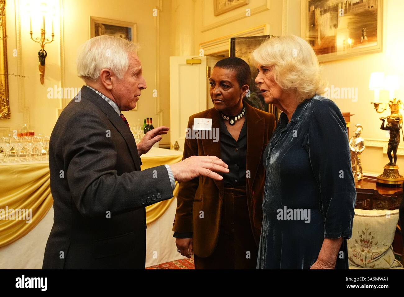 Queen Camilla speaks with David Dimbleby and Adjoa Andoh during a ...