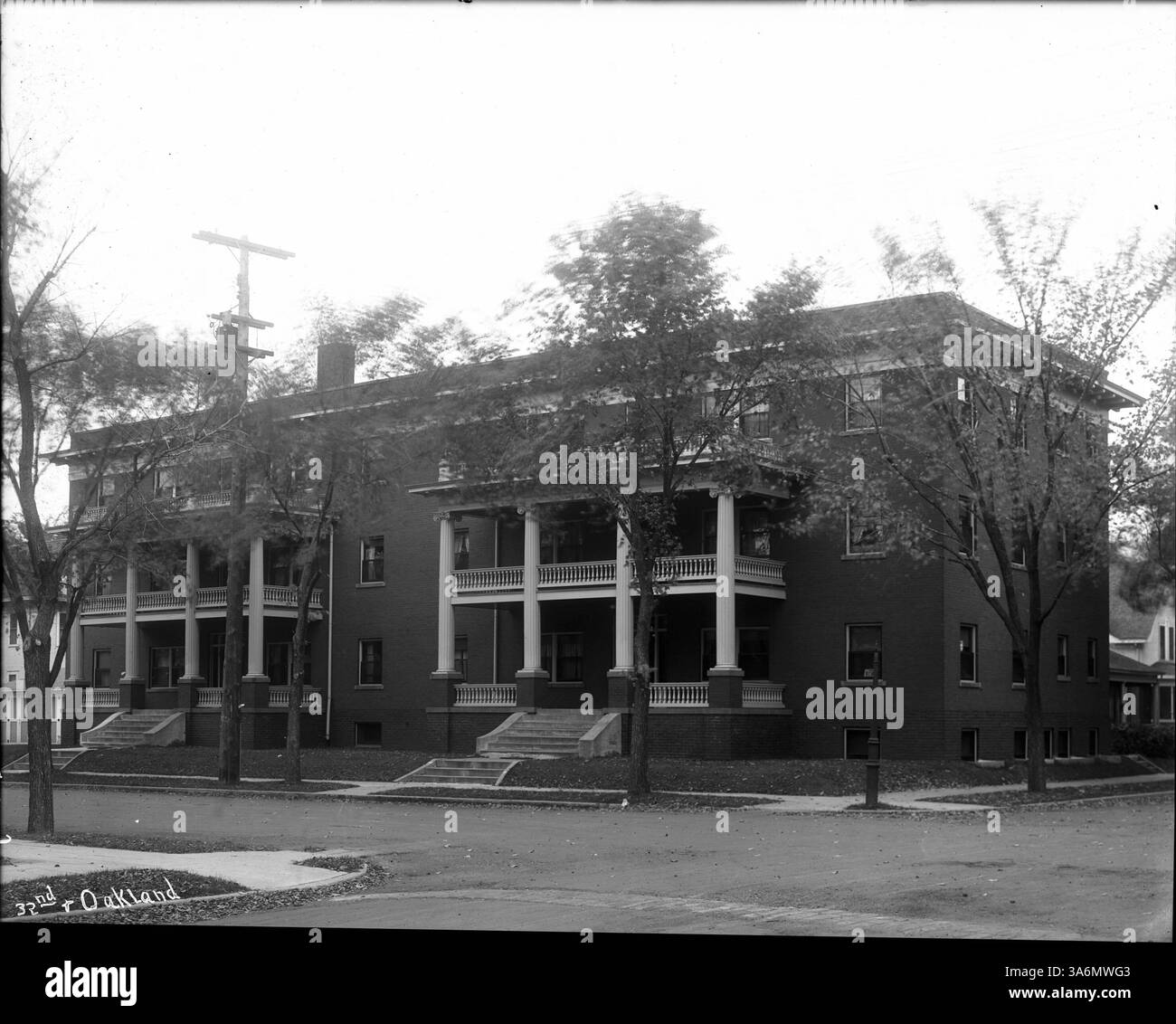 Apartment buildings located at the corner of 32nd Street and Oakland ...