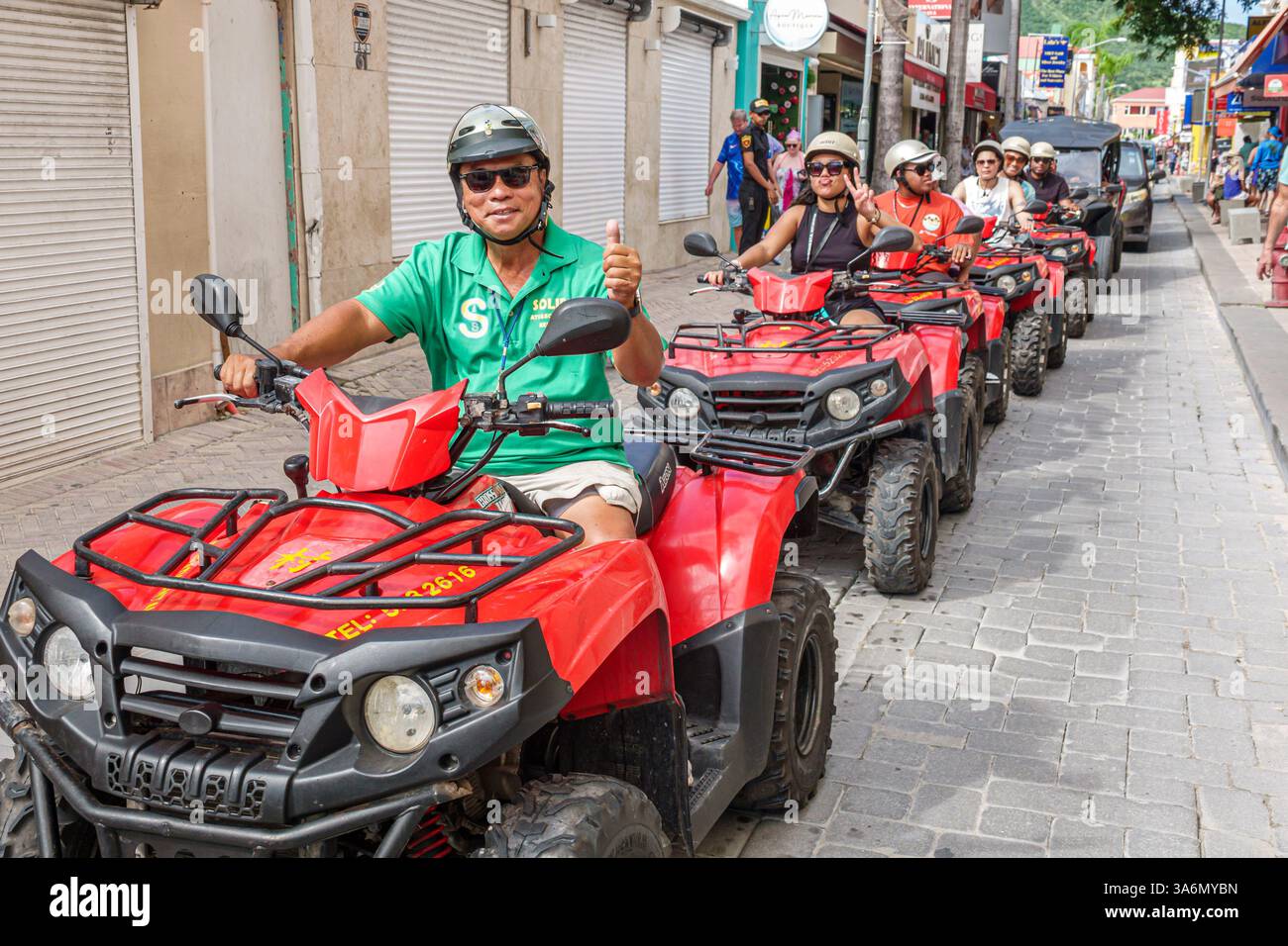 Tourists riding all terrain vehicles hi-res stock photography and ...