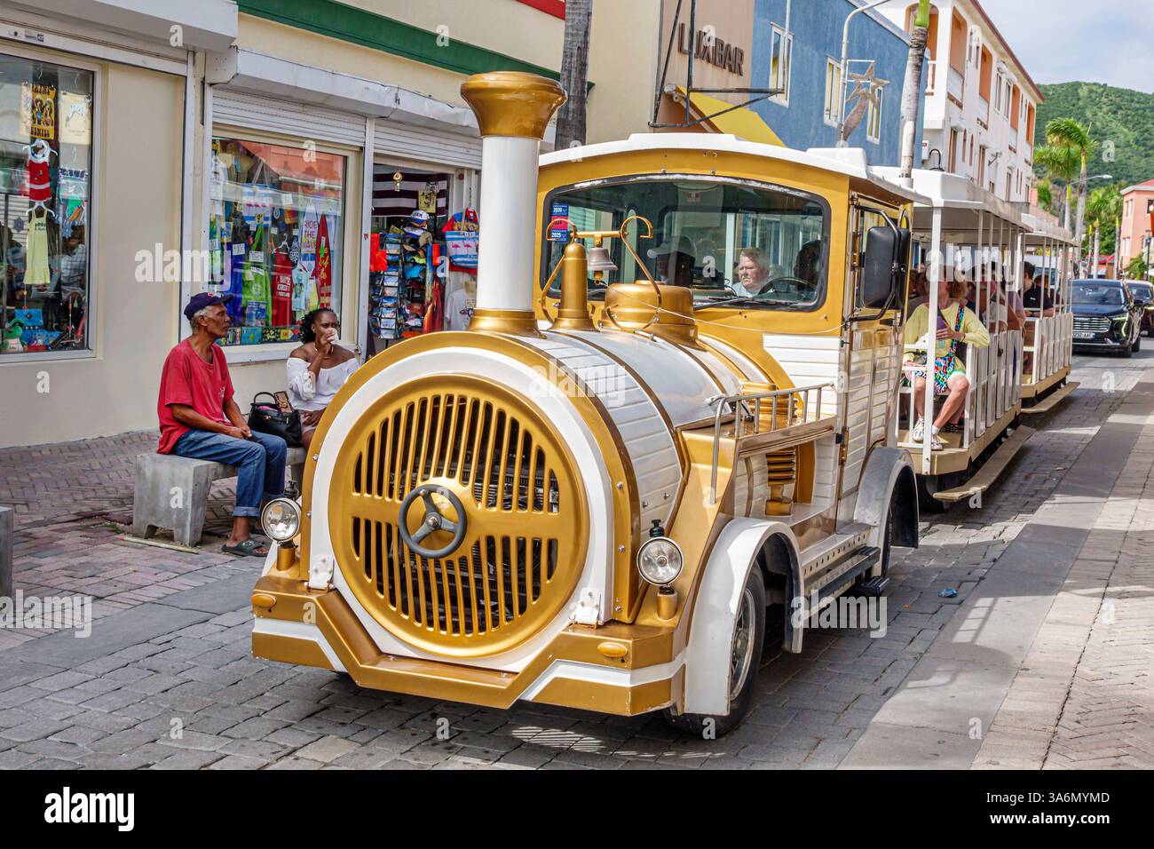 Gold white sightseeing tram hi-res stock photography and images - Alamy