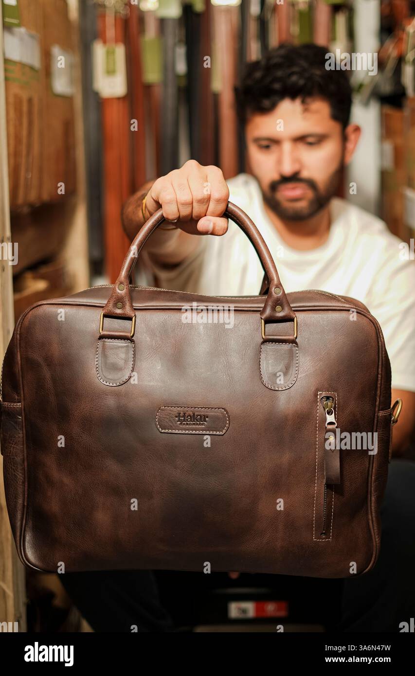 Leather goods handmade by artisans in Ecuador Stock Photo - Alamy