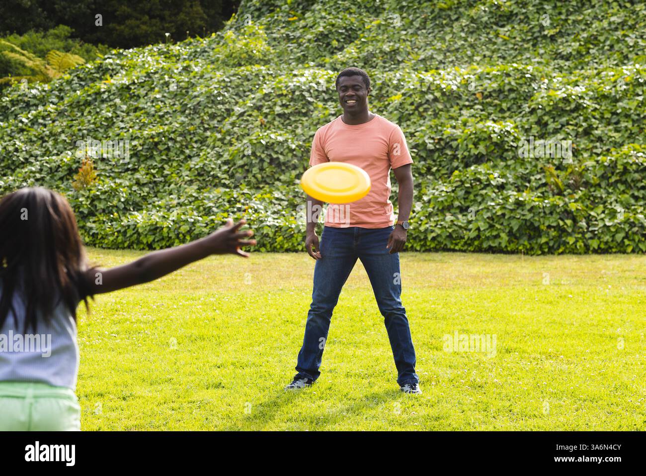 African american father playing frisbee hi-res stock photography and ...