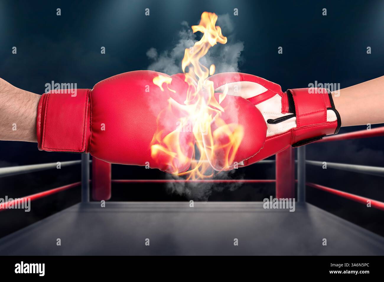 Boxers fighting in boxing ring, closeup. Smoke and flames between their ...