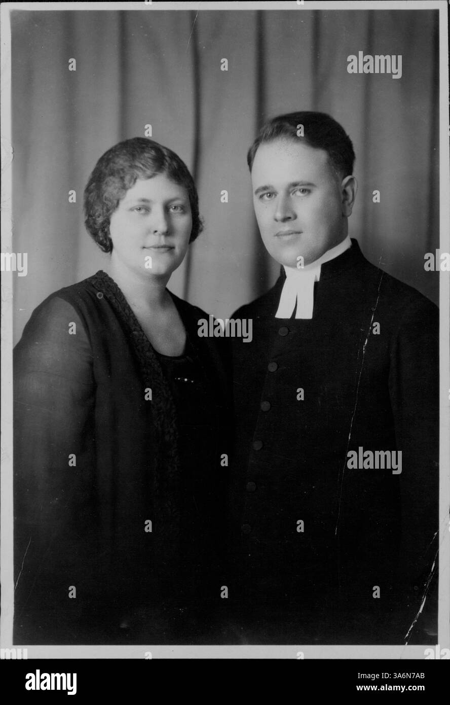This photo captures Reverend and Mrs. Daniel T. Martin, a notable ...