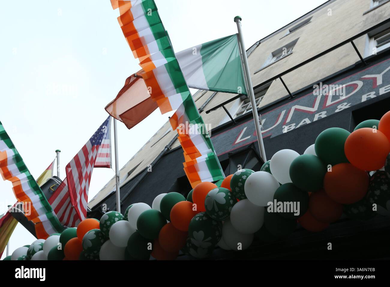 Dublin, Ireland - 18th March 2025 - An Irish flag and Irish themed ...
