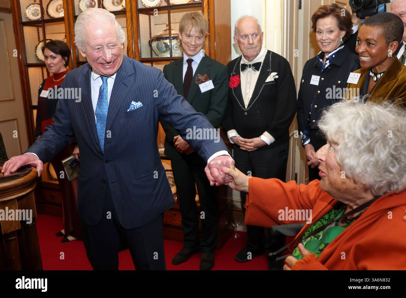 King Charles III greets Miriam Margolyes during a reception at Clarence House, London, for ...