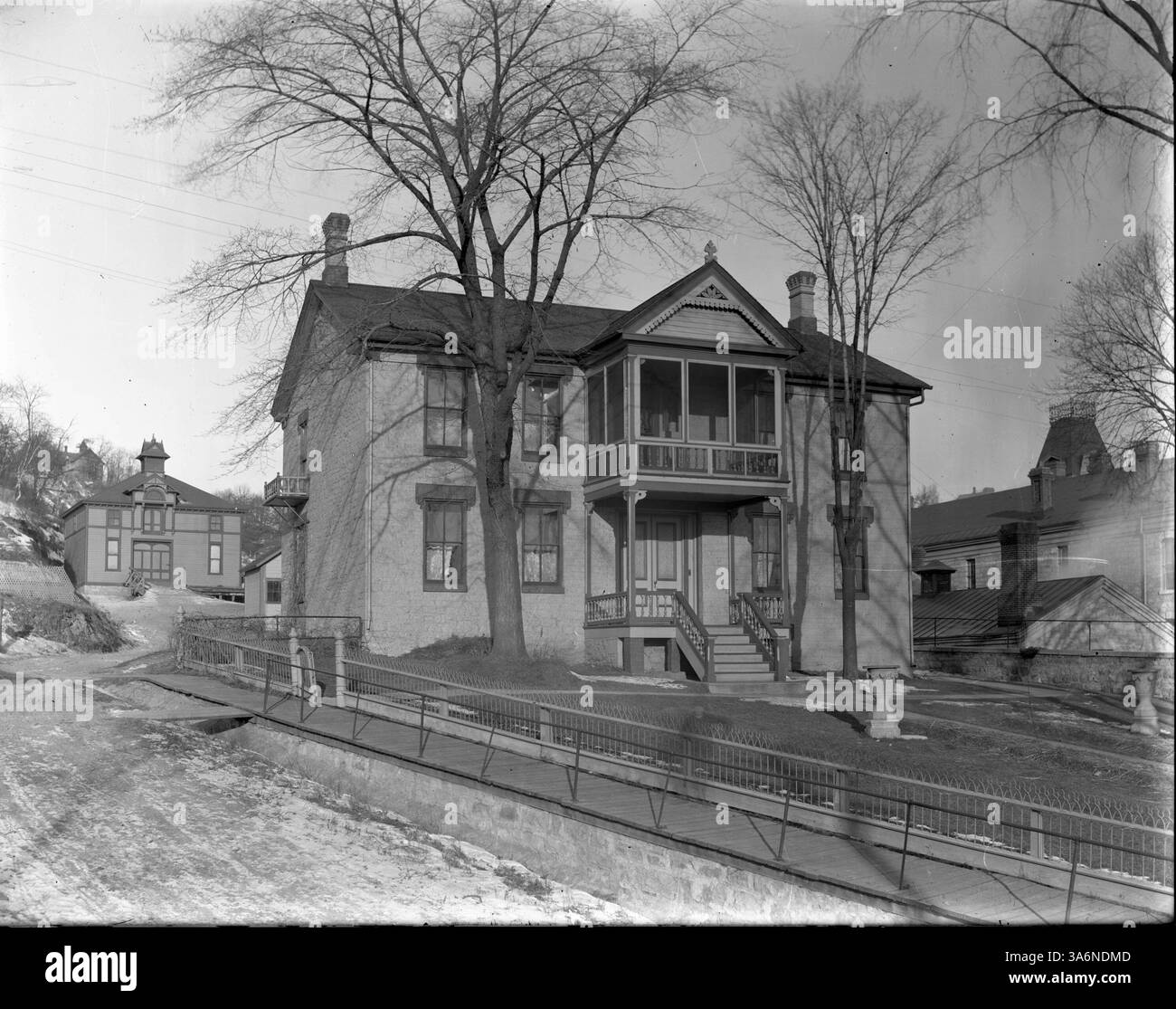 This photograph shows Warden Wolfer's house next to Stillwater State ...