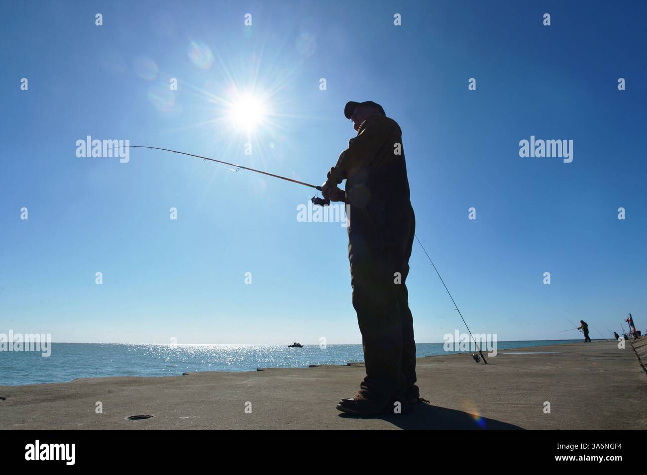 Steve Weckwerth, of Watervliet, Mich., takes advantage of clear weather ...