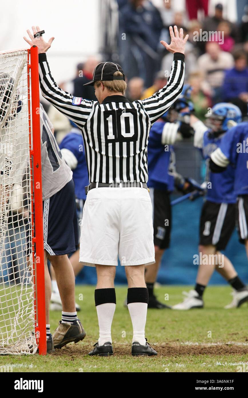 Referee signals a score for Duke in a Division I NCAA lacrosse game ...