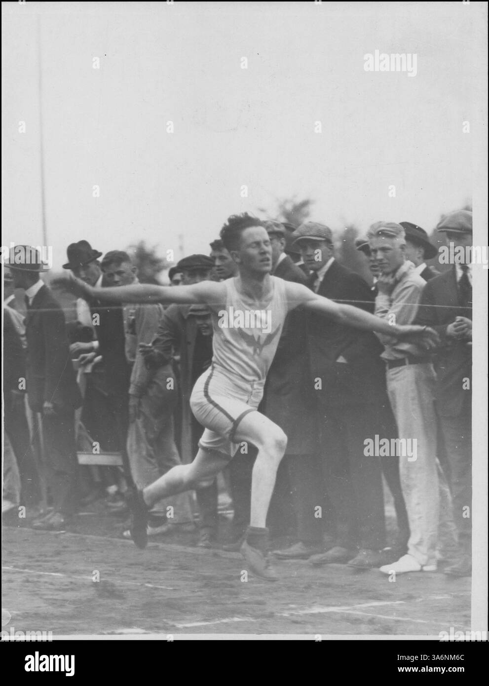Arthur Drew, a distance runner from West High School, is captured ...
