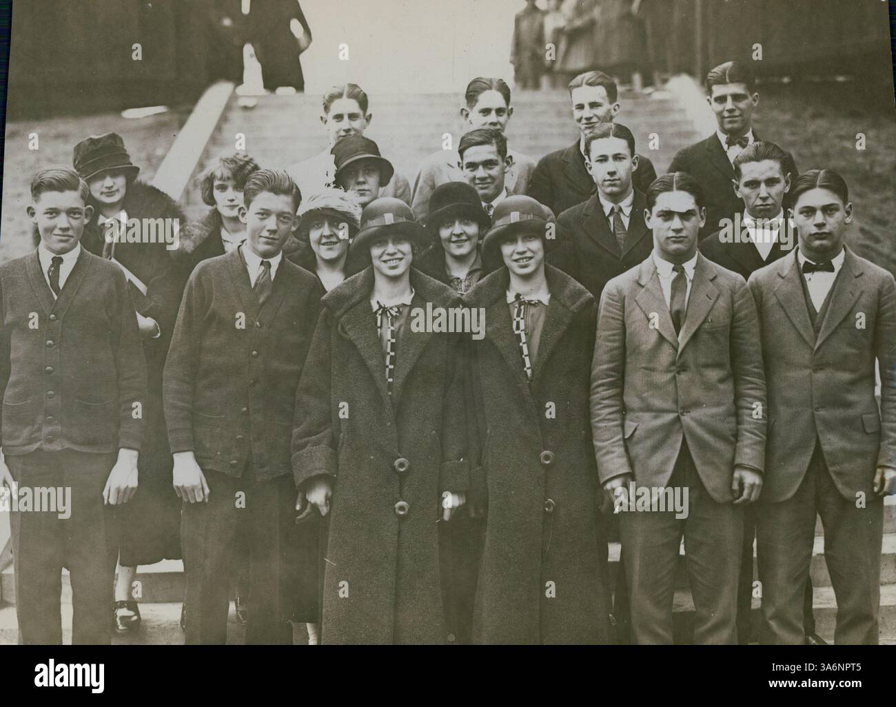 A group photo of nine pairs of twins at West High, including students ...