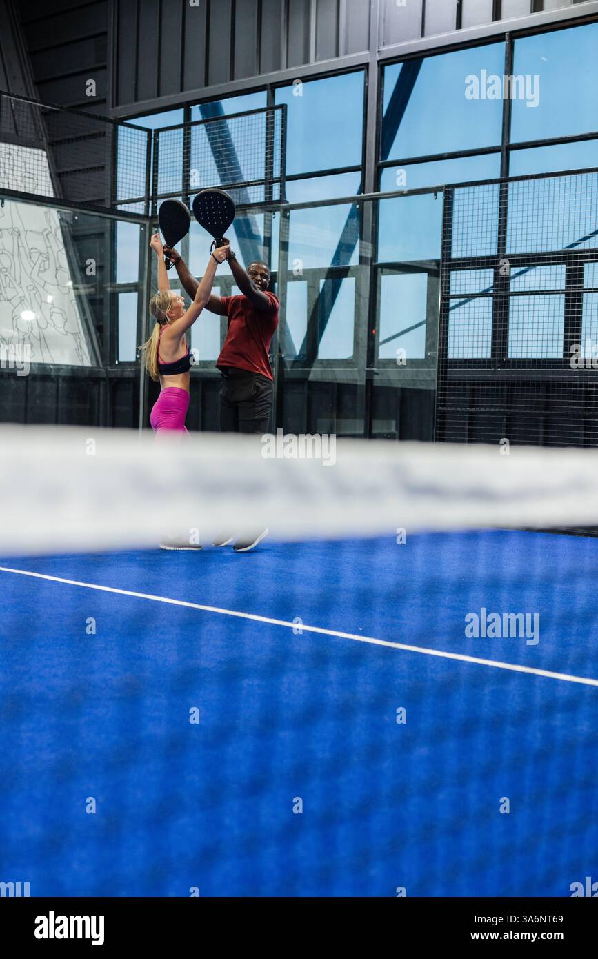 Woman playing padel tennis celebrating hi-res stock photography and ...
