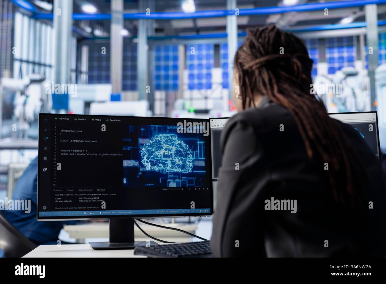 Engineer developing AI algorithms on PC in solar panel plant, training ...