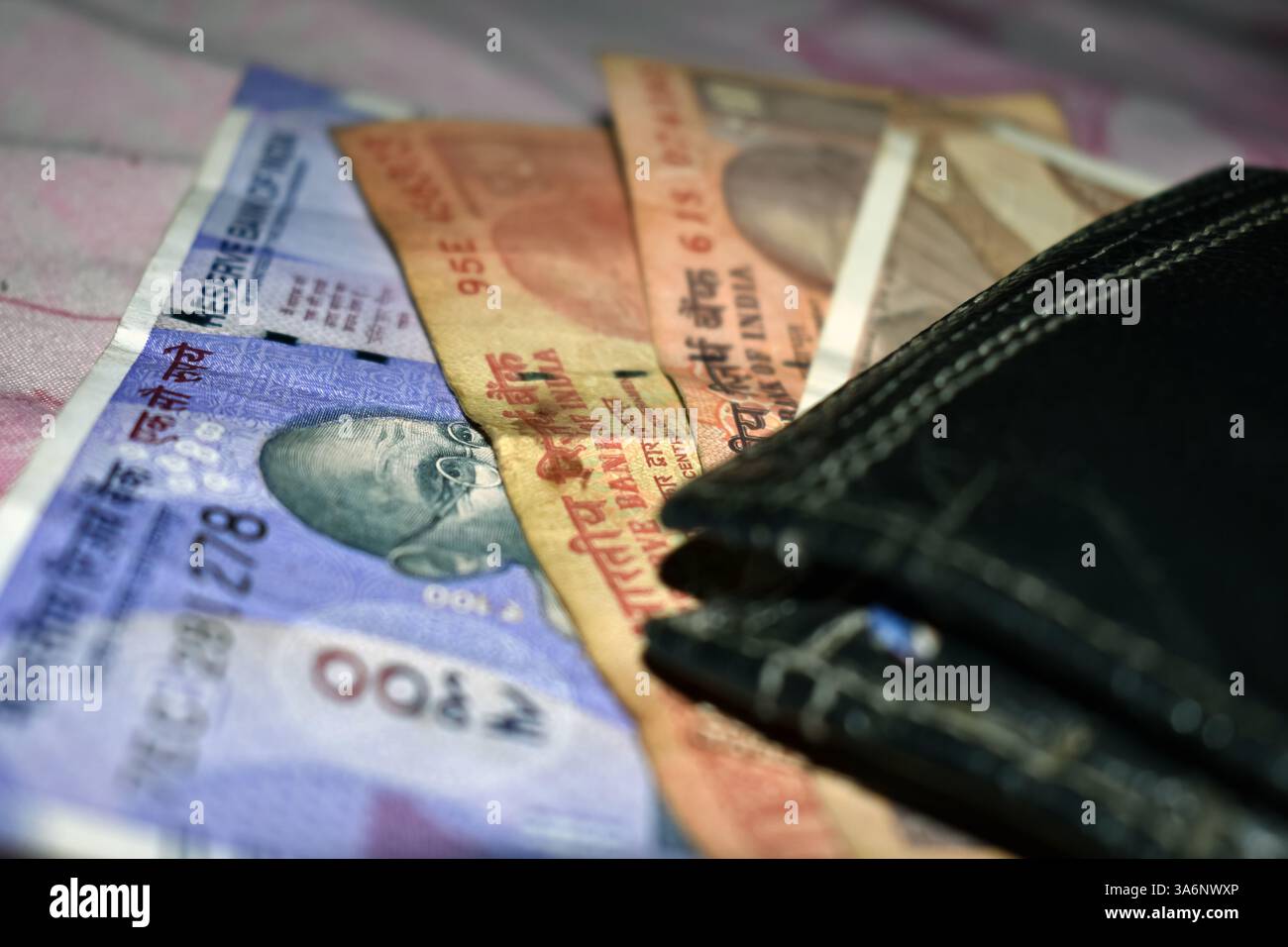 Indian money and banknotes, 100 rupees and 20 rupees. Background of ...
