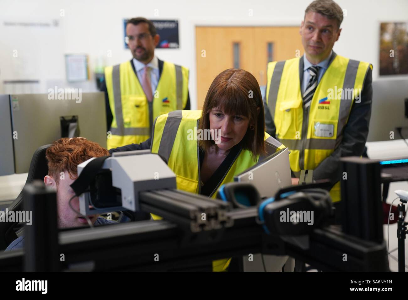 Chancellor of the Exchequer Rachel Reeves is shown a simulator during a ...