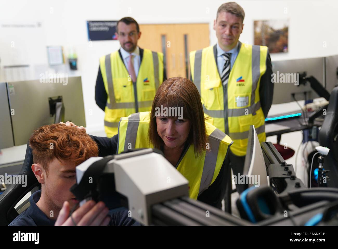 Chancellor of the Exchequer Rachel Reeves is shown a simulator during a ...