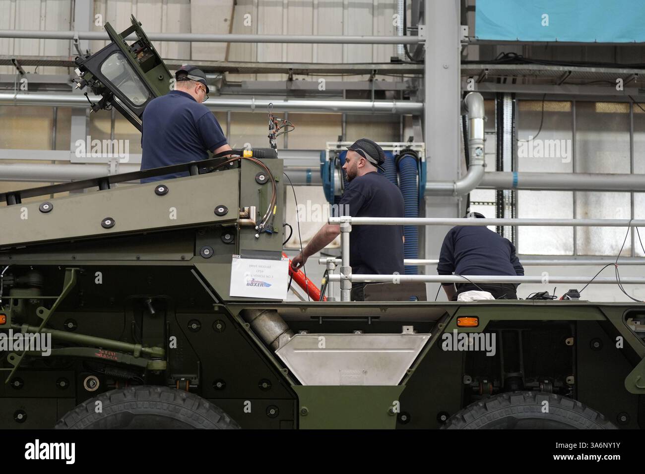 Staff working at Rheinmetall BAE Systems Land (RBSL) in Telford ...