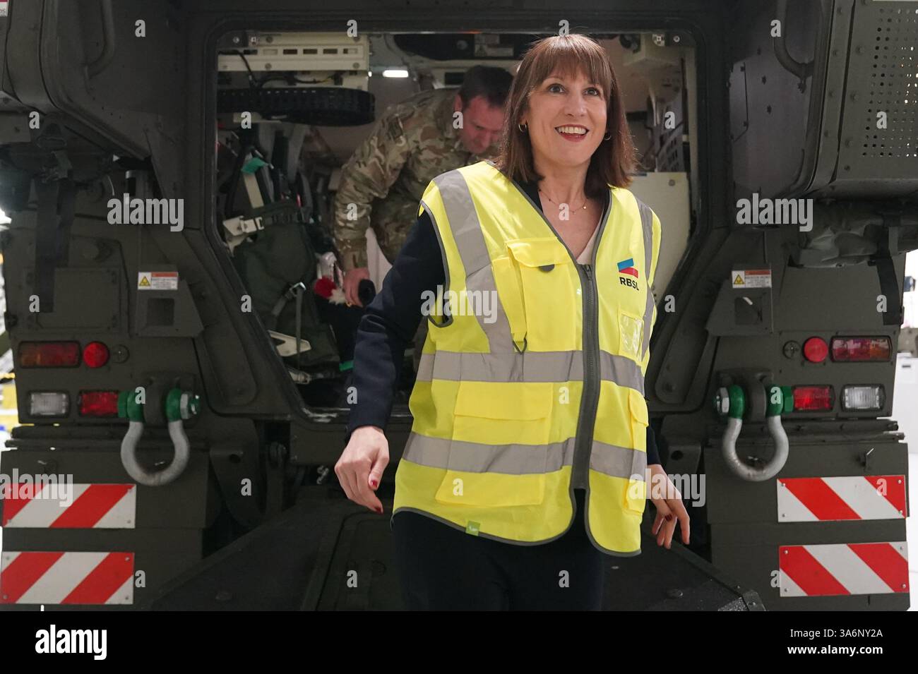 Chancellor of the Exchequer Rachel Reeves is shown a military vehicle ...